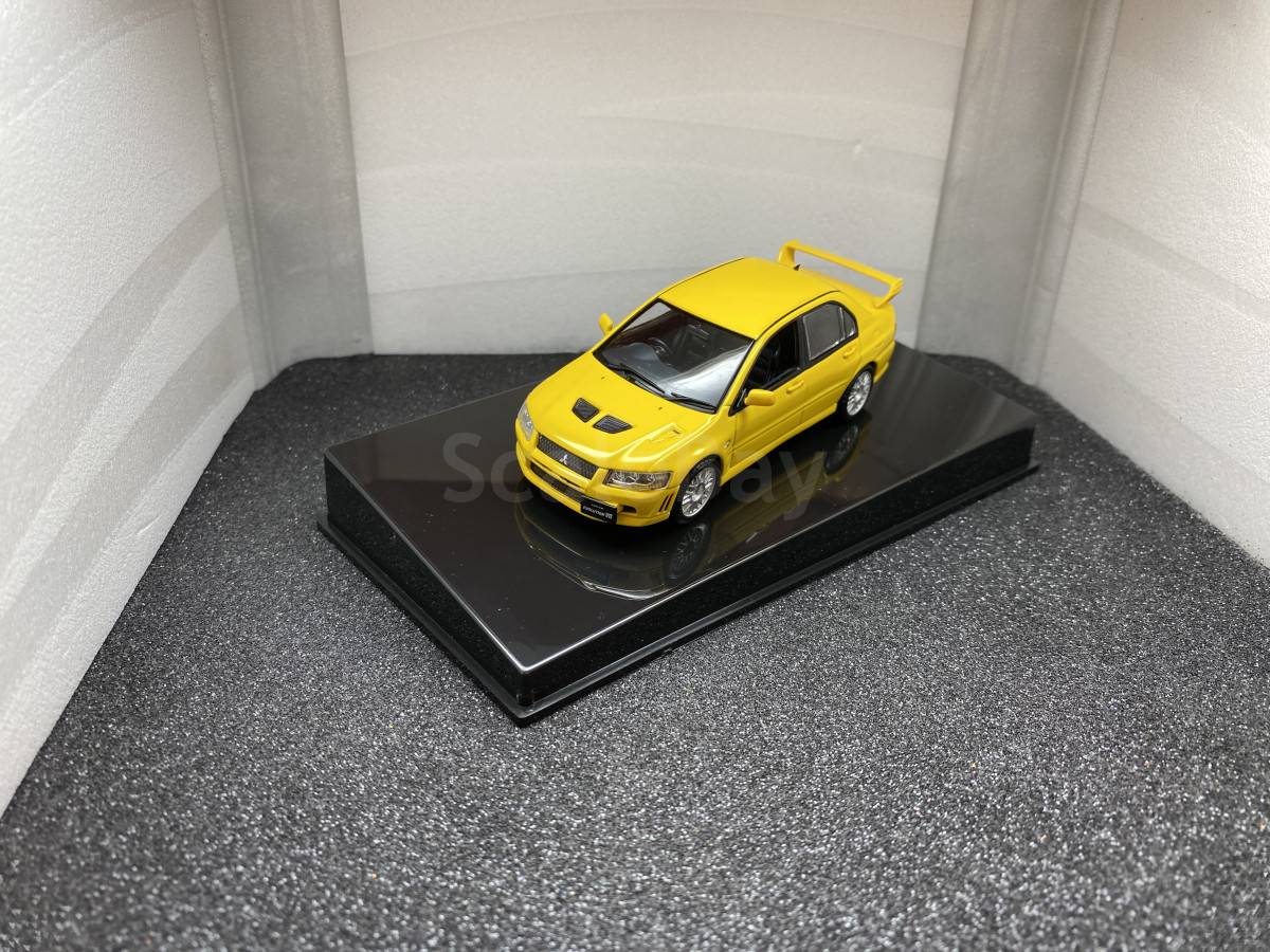 Mitsubishi Lancer Evo VII yellow 2001 | Аукцион масштабных и сборных ...